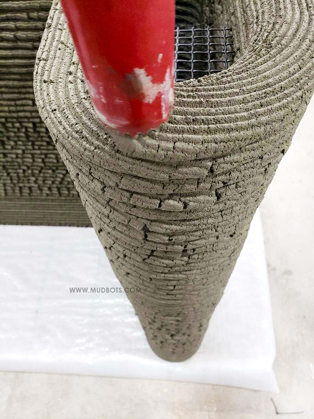 Perspective view on Nozzle Tip and 3D Printed Concrete | MudBots Gallery