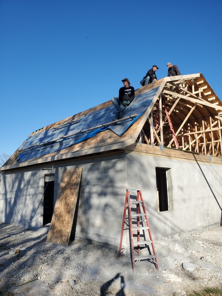 Roof Installation on 3D Printed House - MudBots | MudBots Gallery